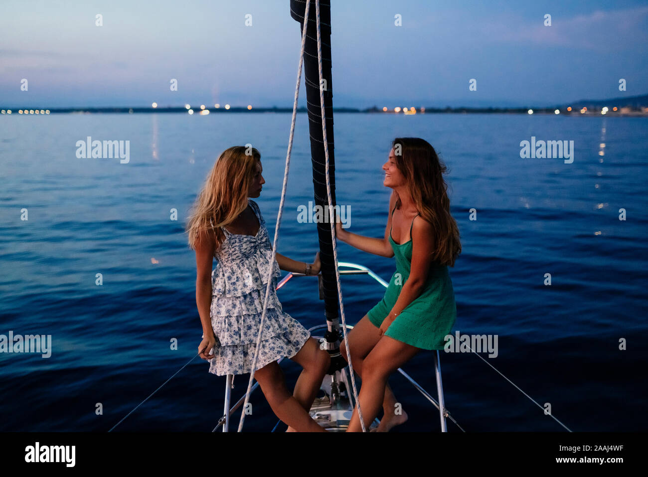 Young woman relaxing on sailboat hi-res stock photography and images ...
