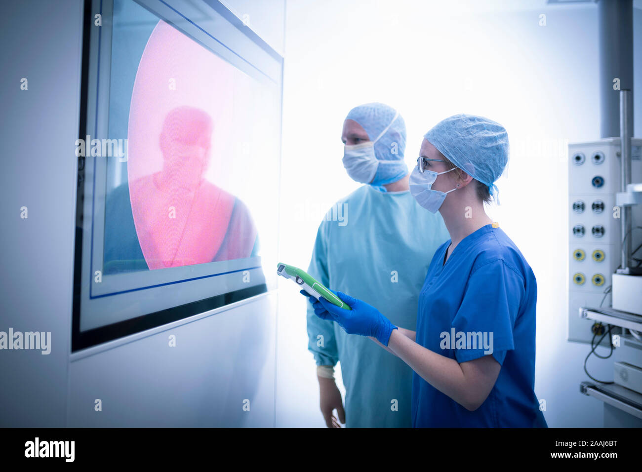 Nurse looking computer monitor in hi-res stock photography and images ...