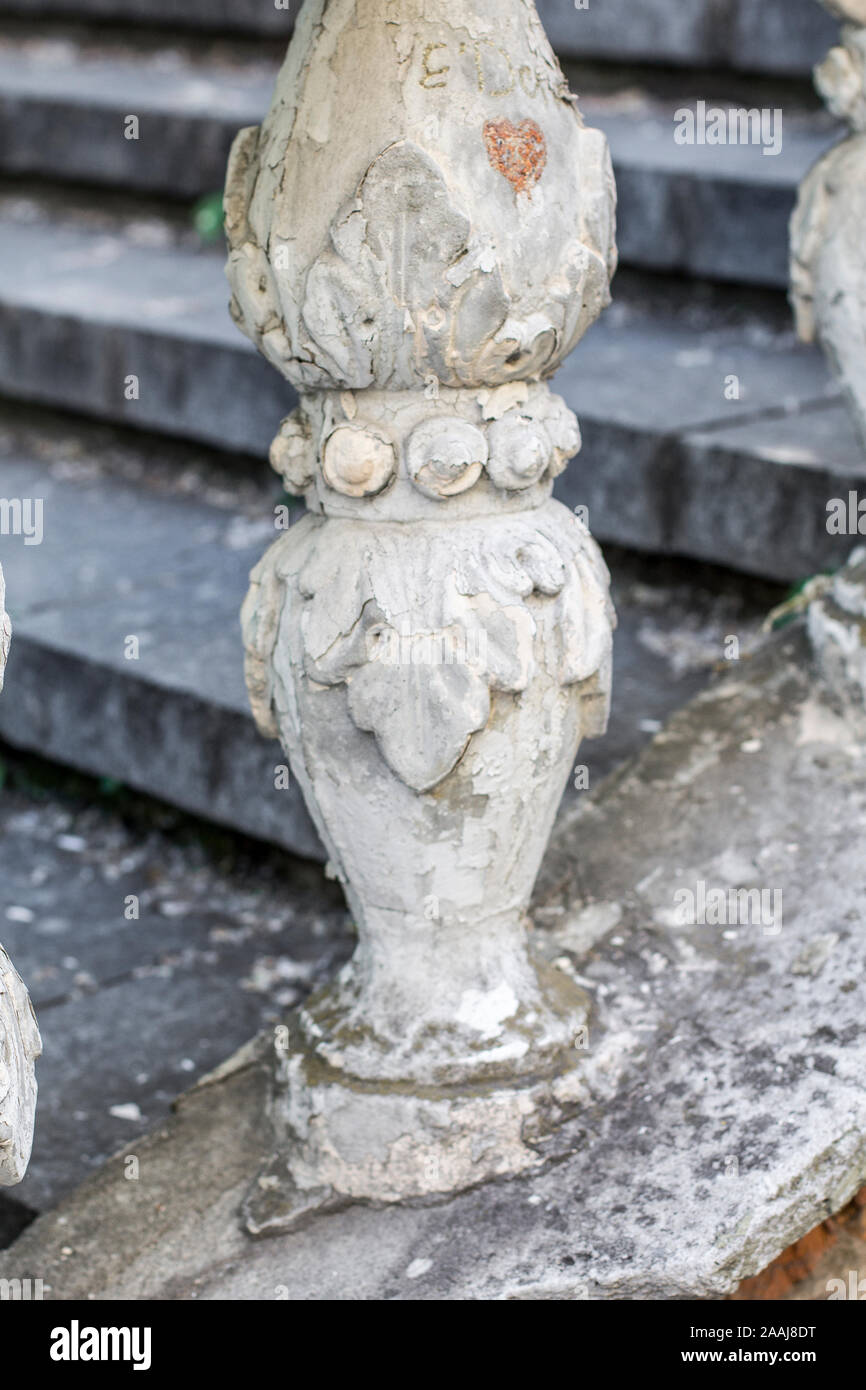Columns on the old staircase. Railing on the stairs Stock Photo - Alamy
