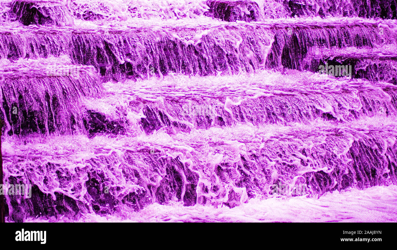 Water Cascading over Weir Steps on canal slipway showing blur blurred ...