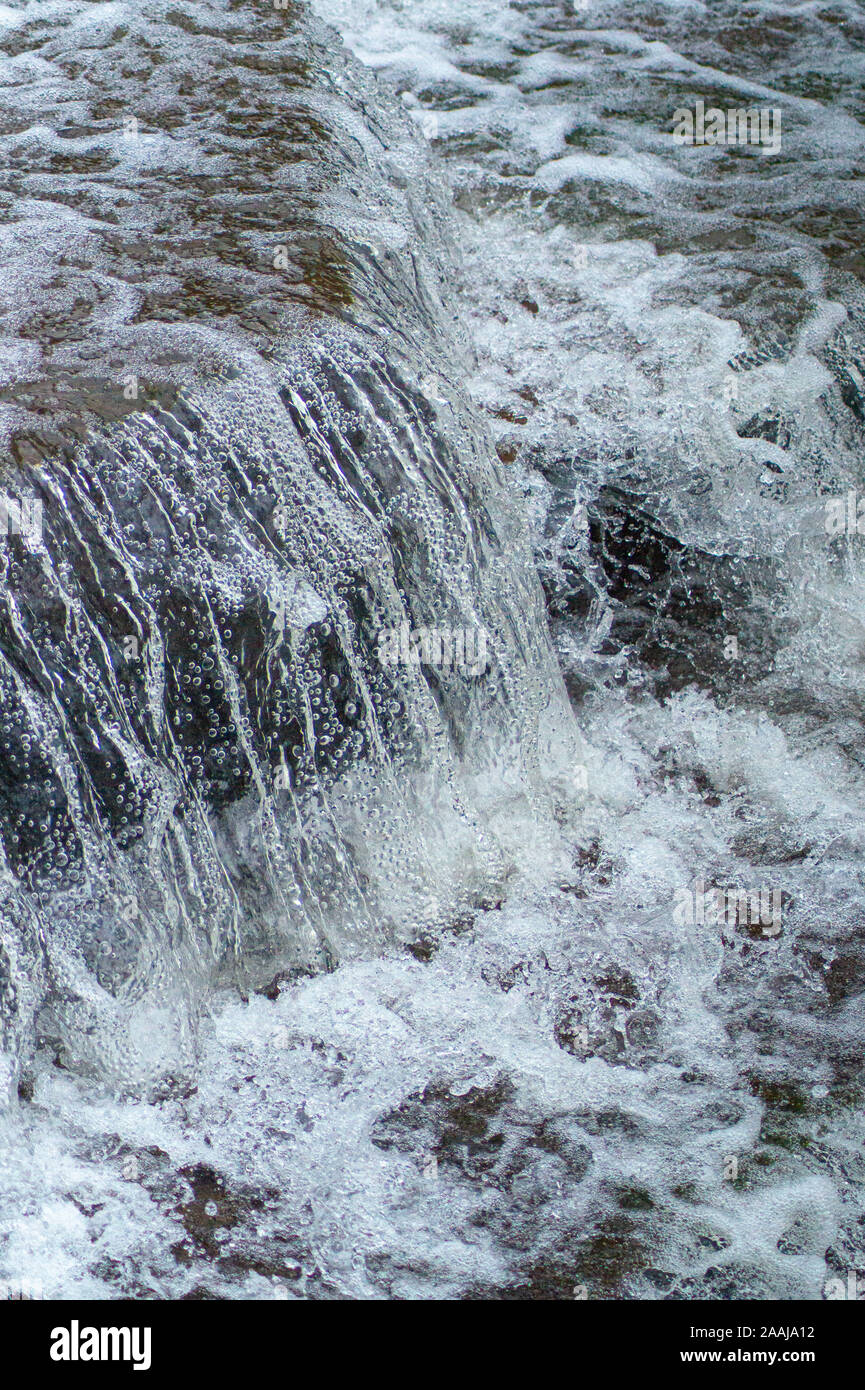 Water Cascading over Weir Steps on canal slipway showing blur blurred ...