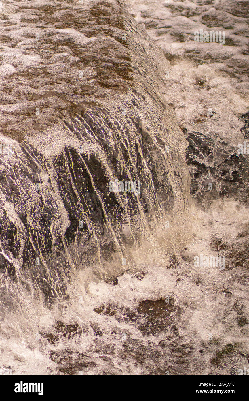 Water Cascading over Weir Steps on canal slipway showing blur blurred ...