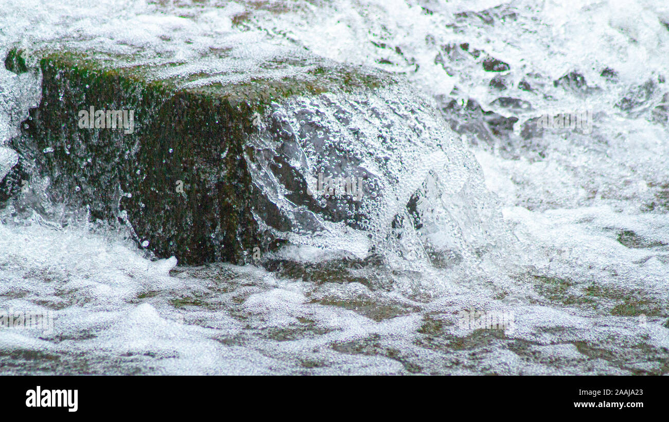 Water Cascading over Weir Steps on canal slipway showing blur blurred ...