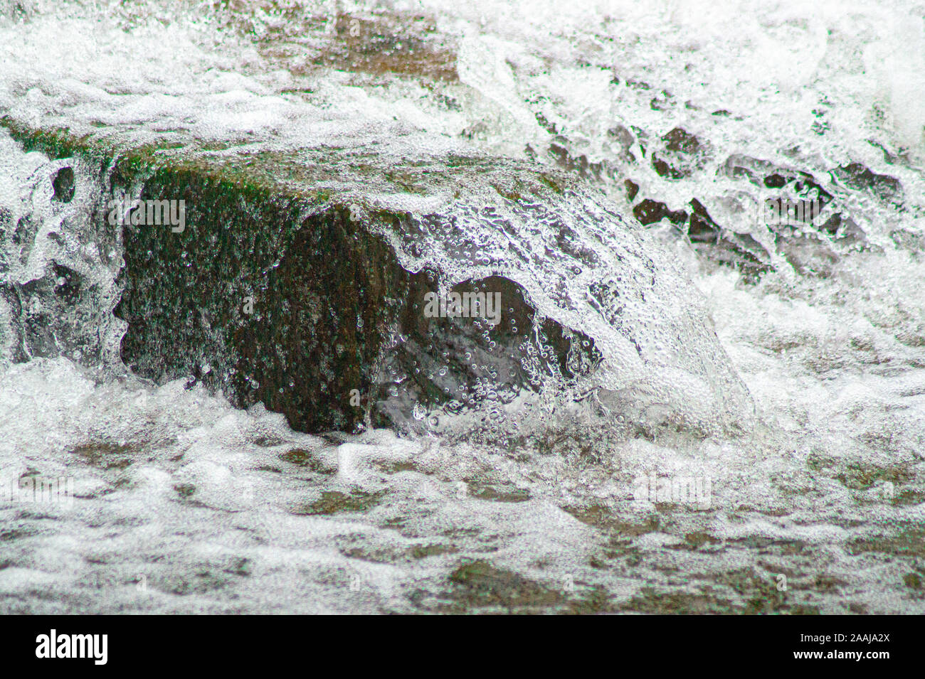 Water Cascading over Weir Steps on canal slipway showing blur blurred ...