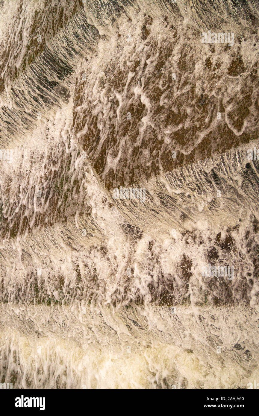 Water Cascading over Weir Steps on canal slipway showing blur blurred ...