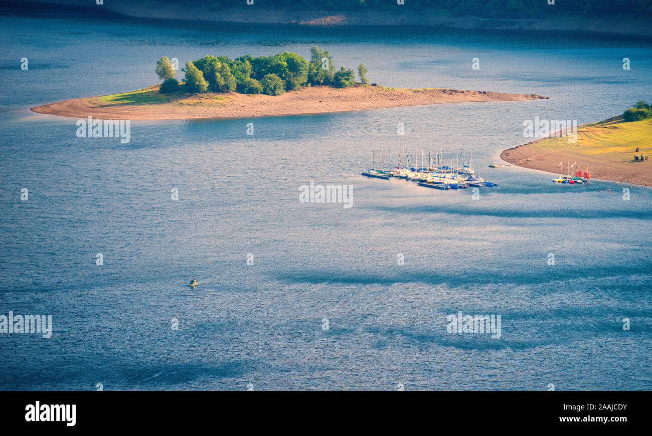 beautiful lake surrounded by mountains Stock Photo - Alamy