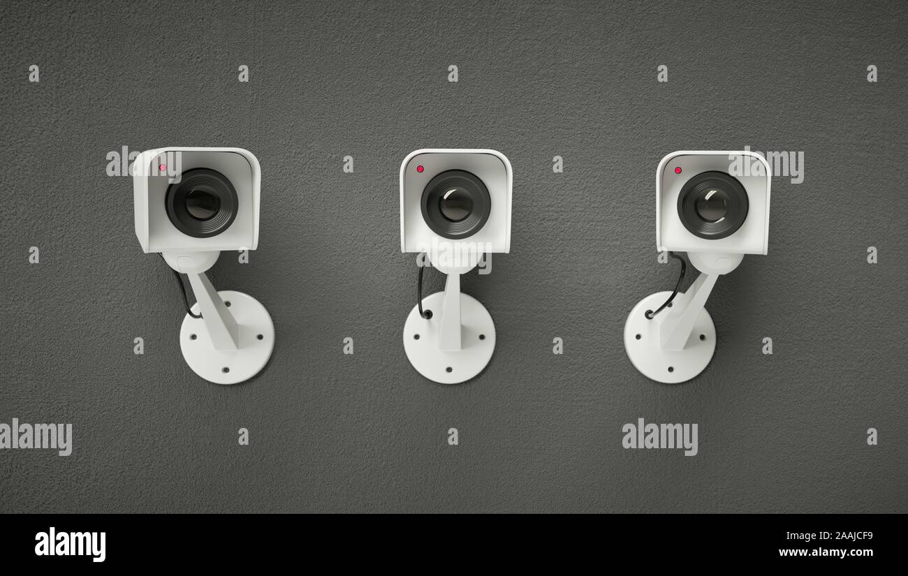 Three surveillance cameras looking at you Stock Photo - Alamy