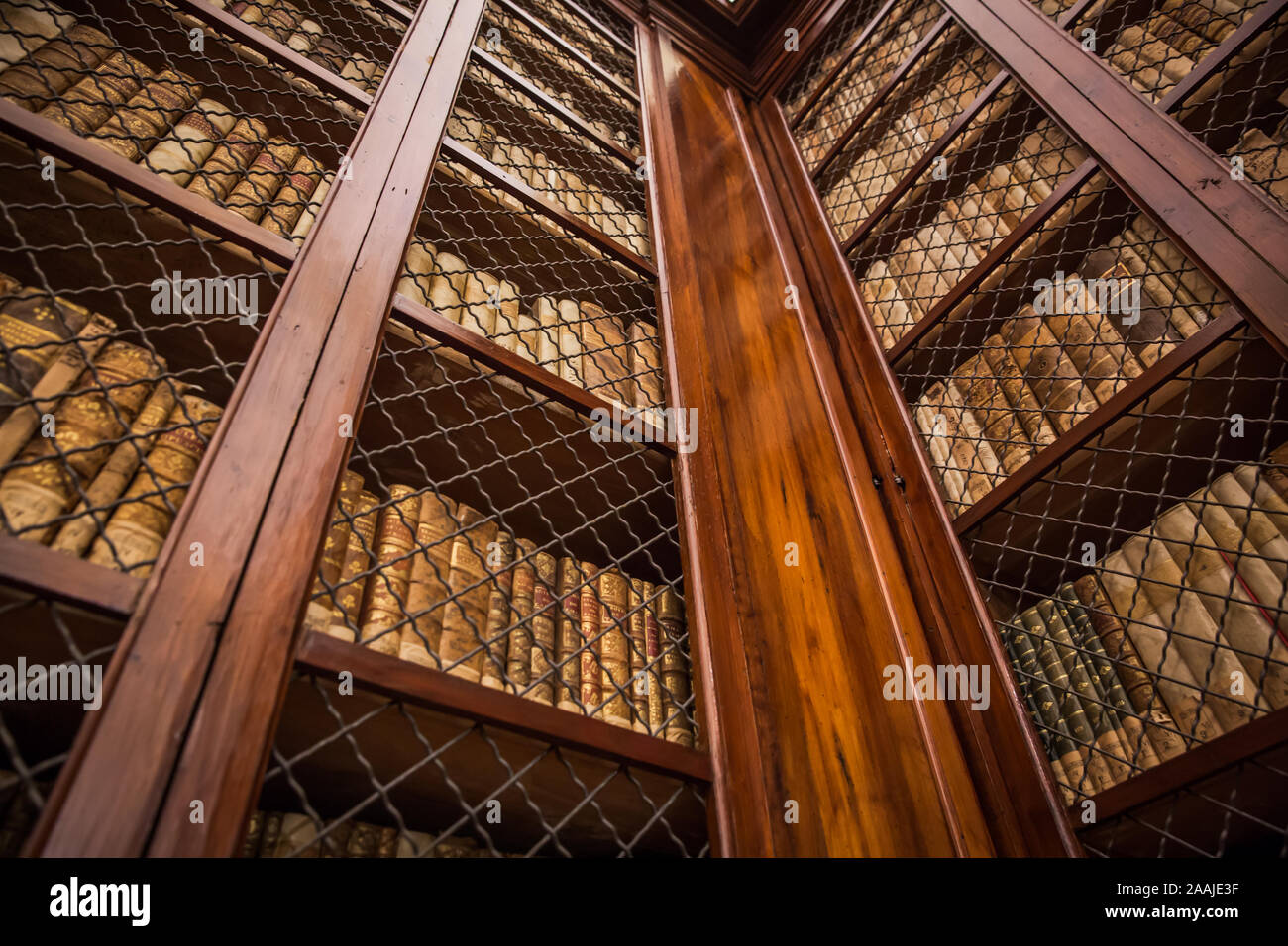 Ancient wooden library in Italy with old books Stock Photo - Alamy