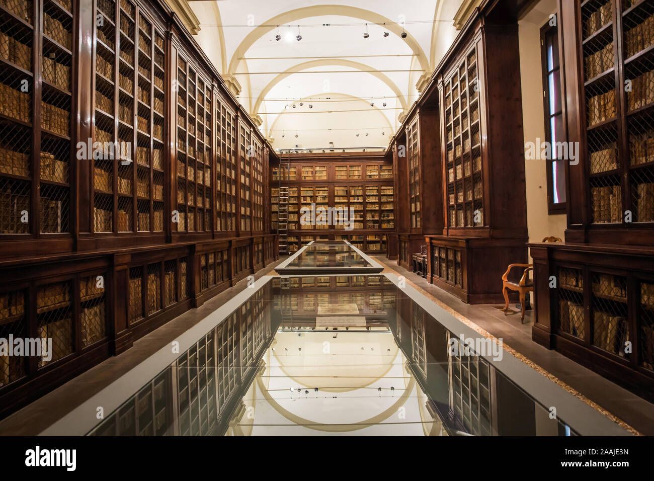 Ancient wooden library in Italy with old books Stock Photo - Alamy