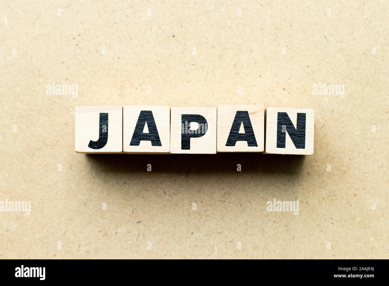 Letter block in word japan on wood background Stock Photo - Alamy