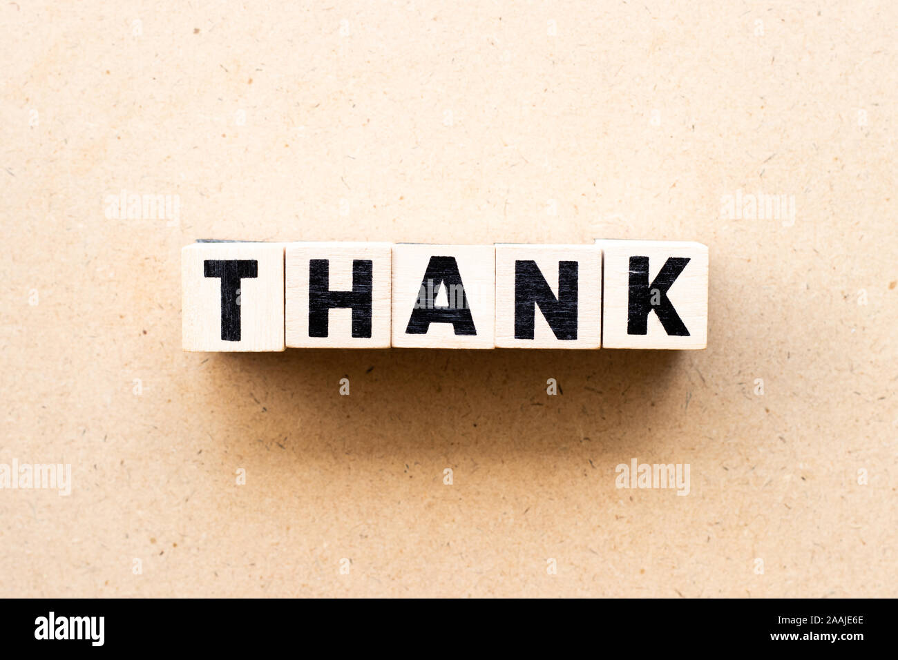 Letter block in word thank on wood background Stock Photo - Alamy