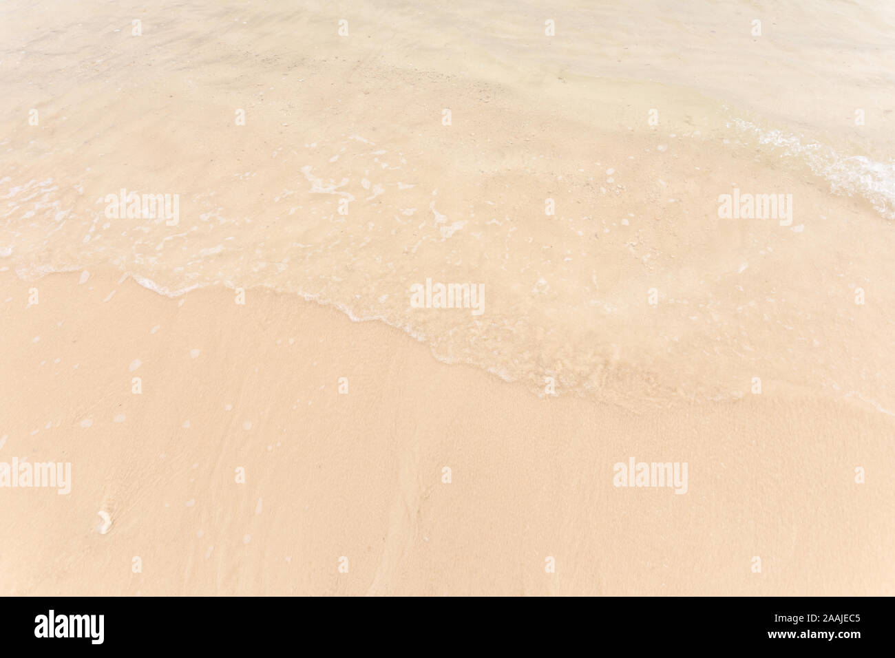 sand on seaside with soft ocean wave Stock Photo - Alamy