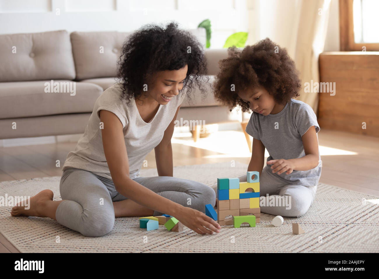 Girl building small bricks hi-res stock photography and images - Alamy