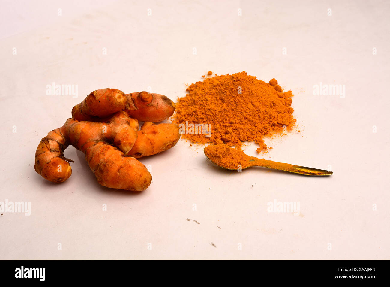 Turmeric rhizome and powder isolated on white background Stock Photo ...