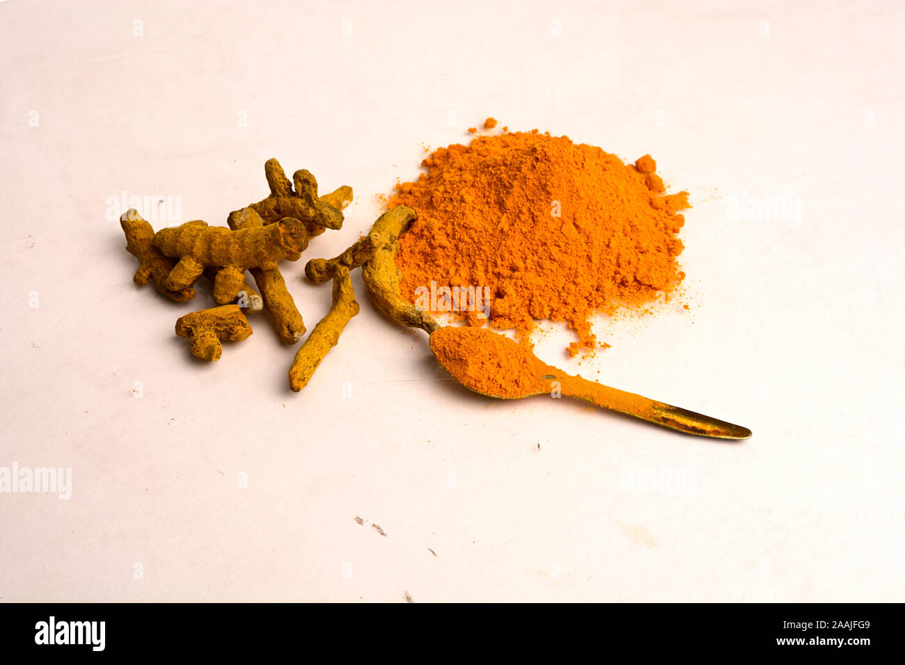 Turmeric rhizome and powder isolated on white background Stock Photo ...