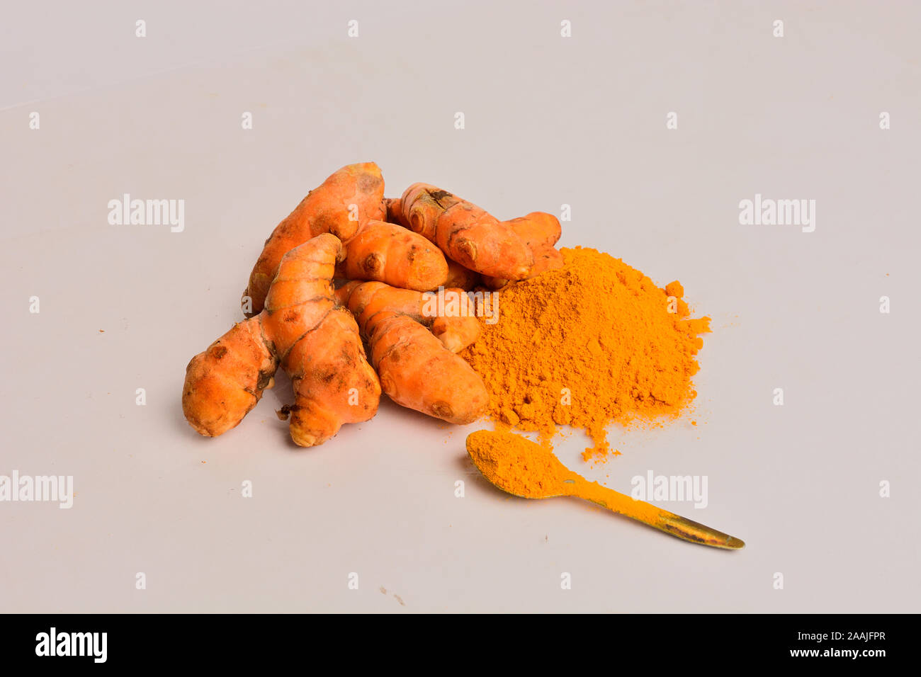 Turmeric rhizome and powder isolated on white background Stock Photo ...