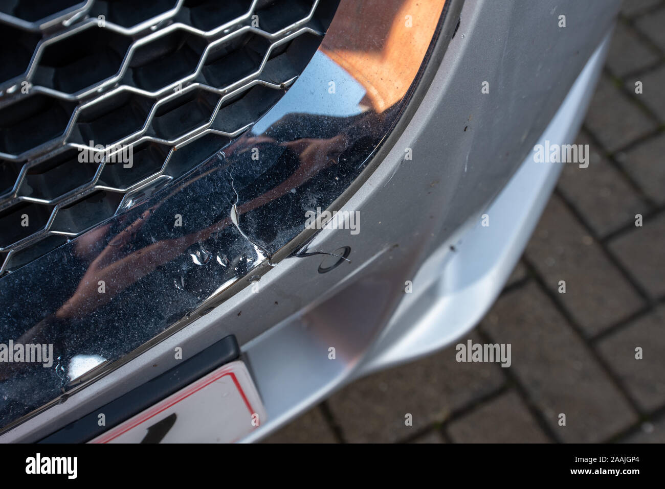 Car Crash: Damage and close up details, silver Jaguar. Road traffic ...
