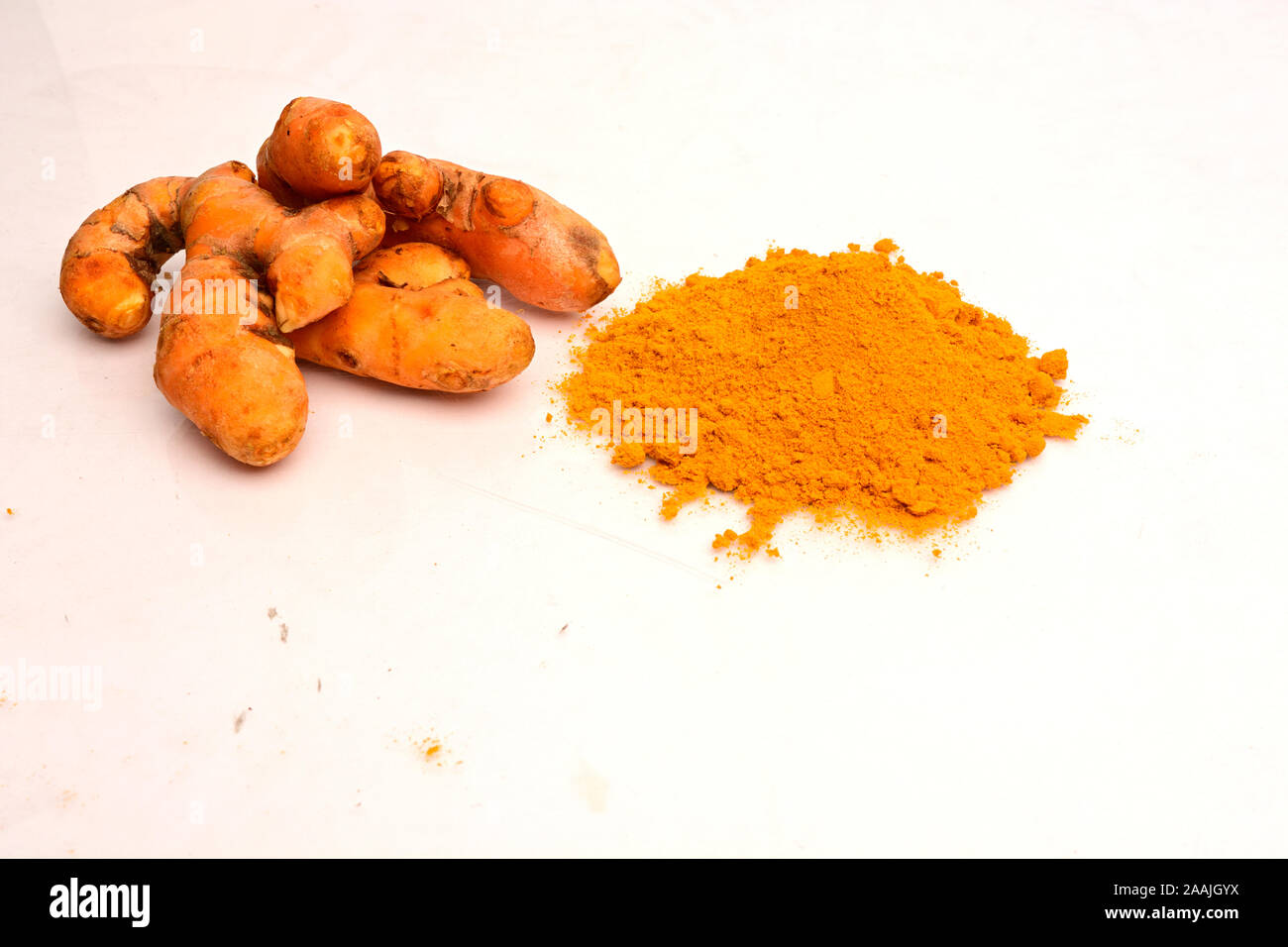 Turmeric rhizome and powder isolated on white background Stock Photo ...