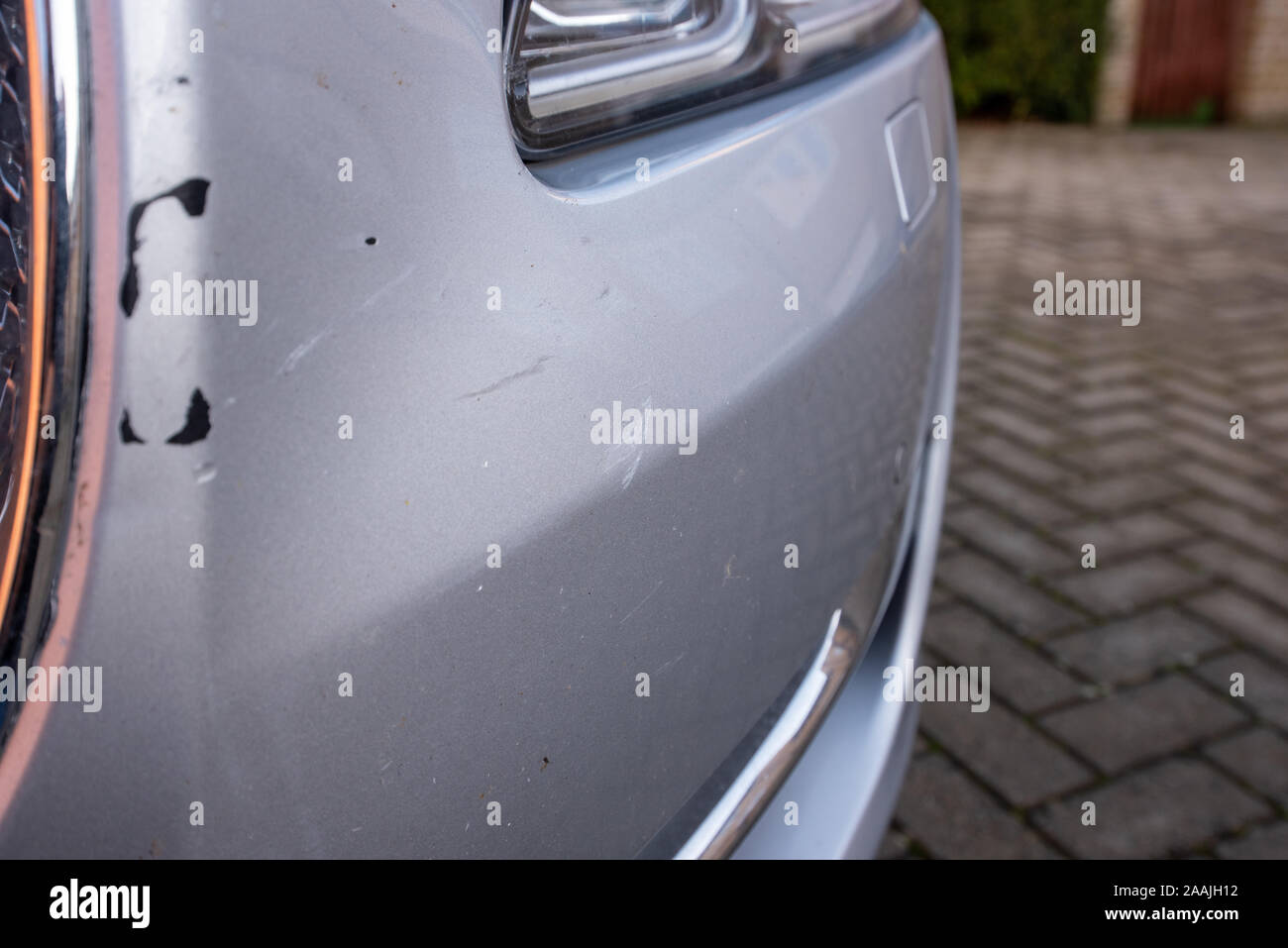 Car Crash: Damage and close up details, silver Jaguar. Road traffic ...
