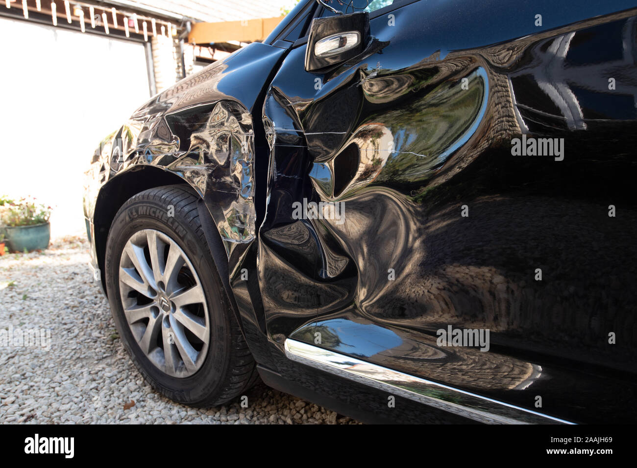 Car Crash: Damage and details of a wrecked vehicle. Close up crushed ...