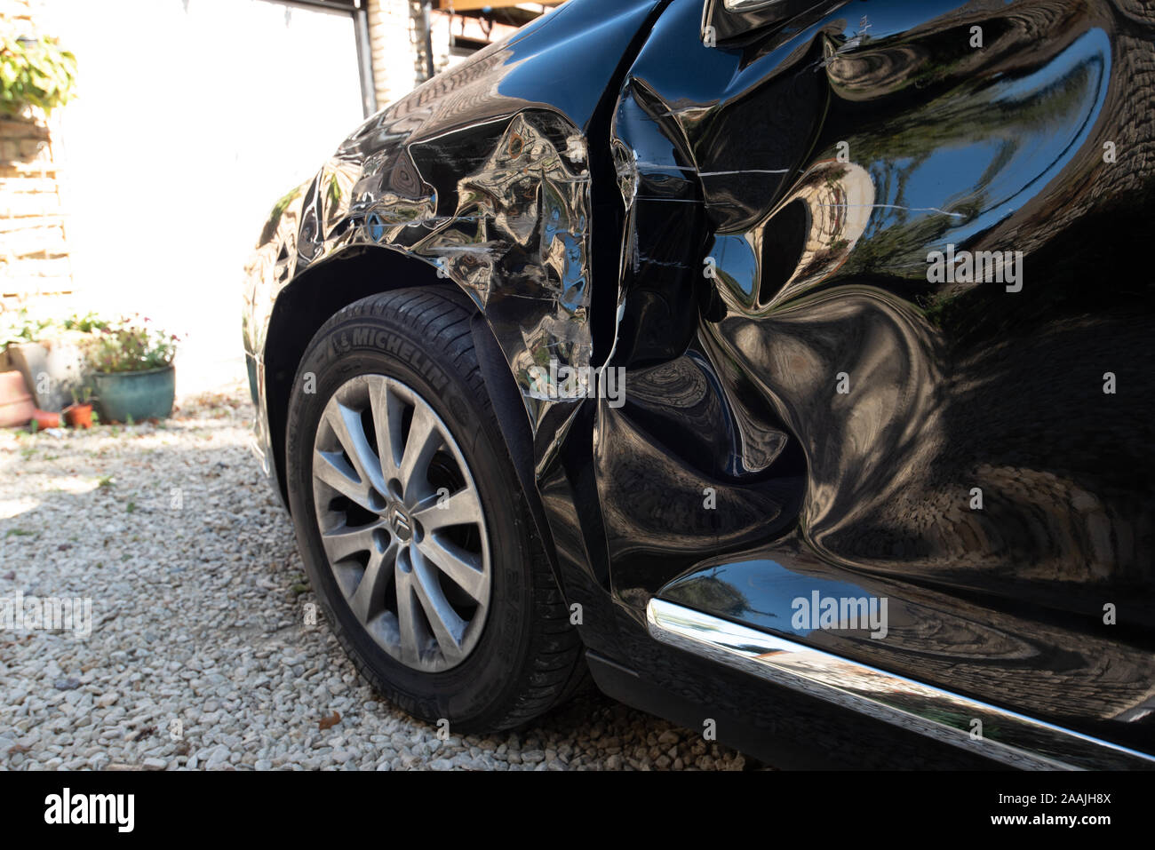 Car Crash: Damage and details of a wrecked vehicle. Close up crushed ...