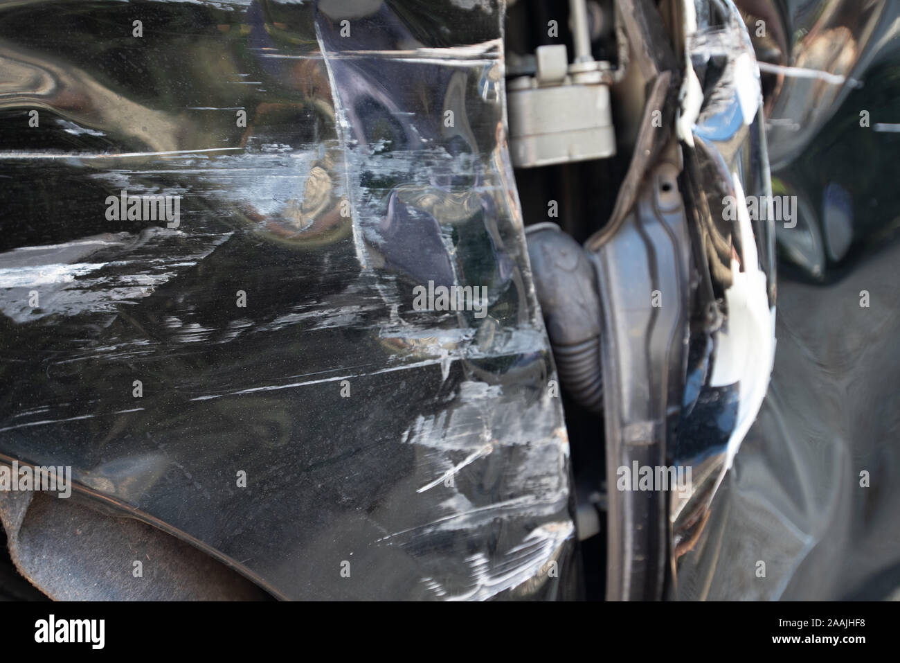 Car Crash: Damage and details of a wrecked vehicle. Close up crushed ...