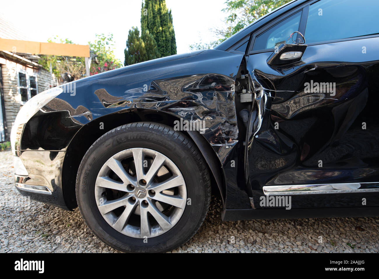 Car Crash: Damage and details of a wrecked vehicle. Close up crushed ...