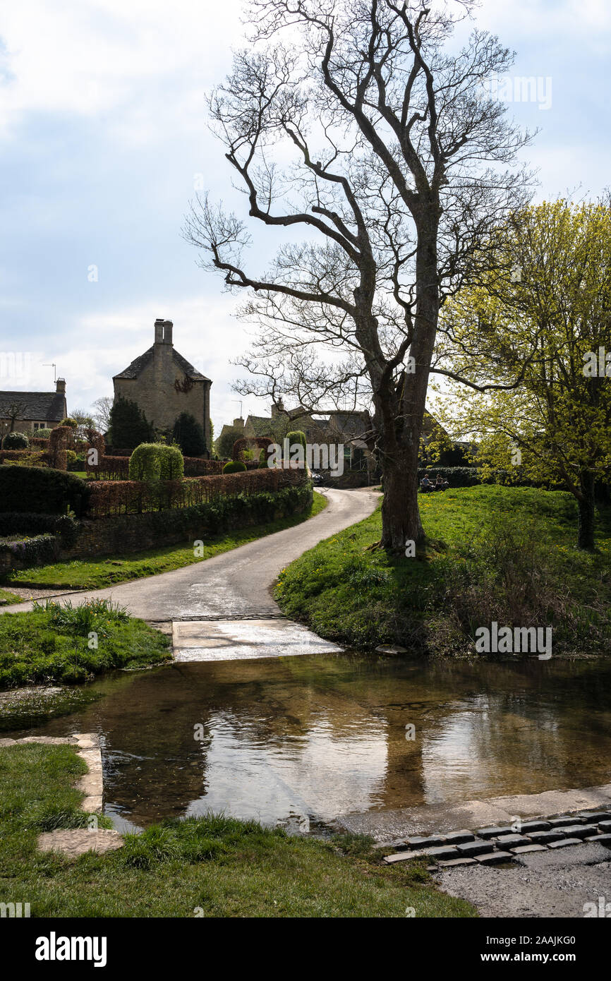 Cute traditional limestone stone houses in rural Britain, England ...