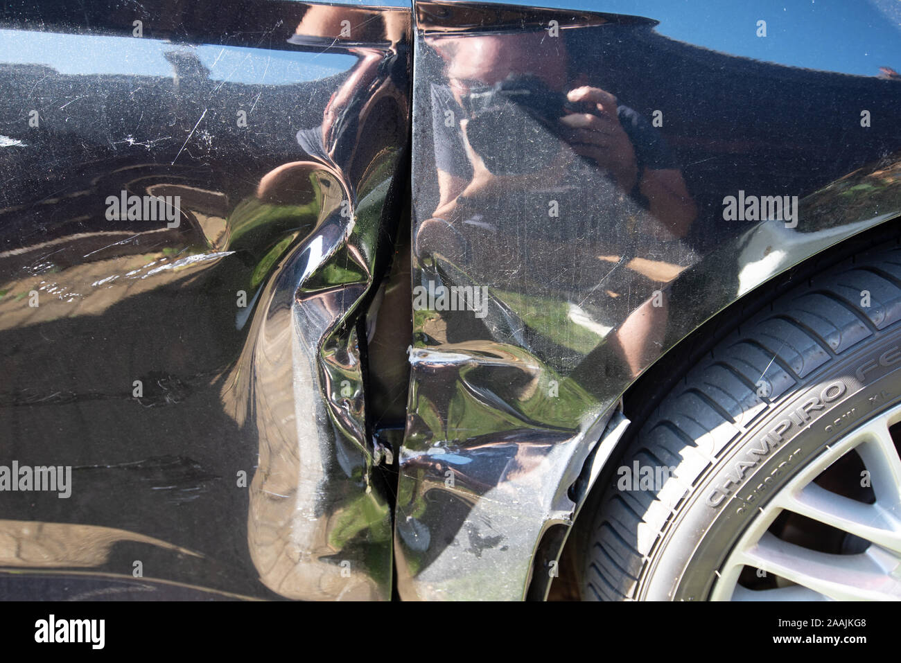 Car Crash: Damage and details of a wrecked vehicle. Close up crushed ...