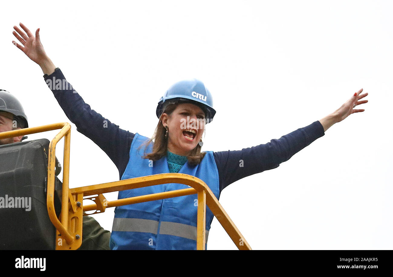 Liberal Democrat leader Jo Swinson on a cherry picker during a visit to ...