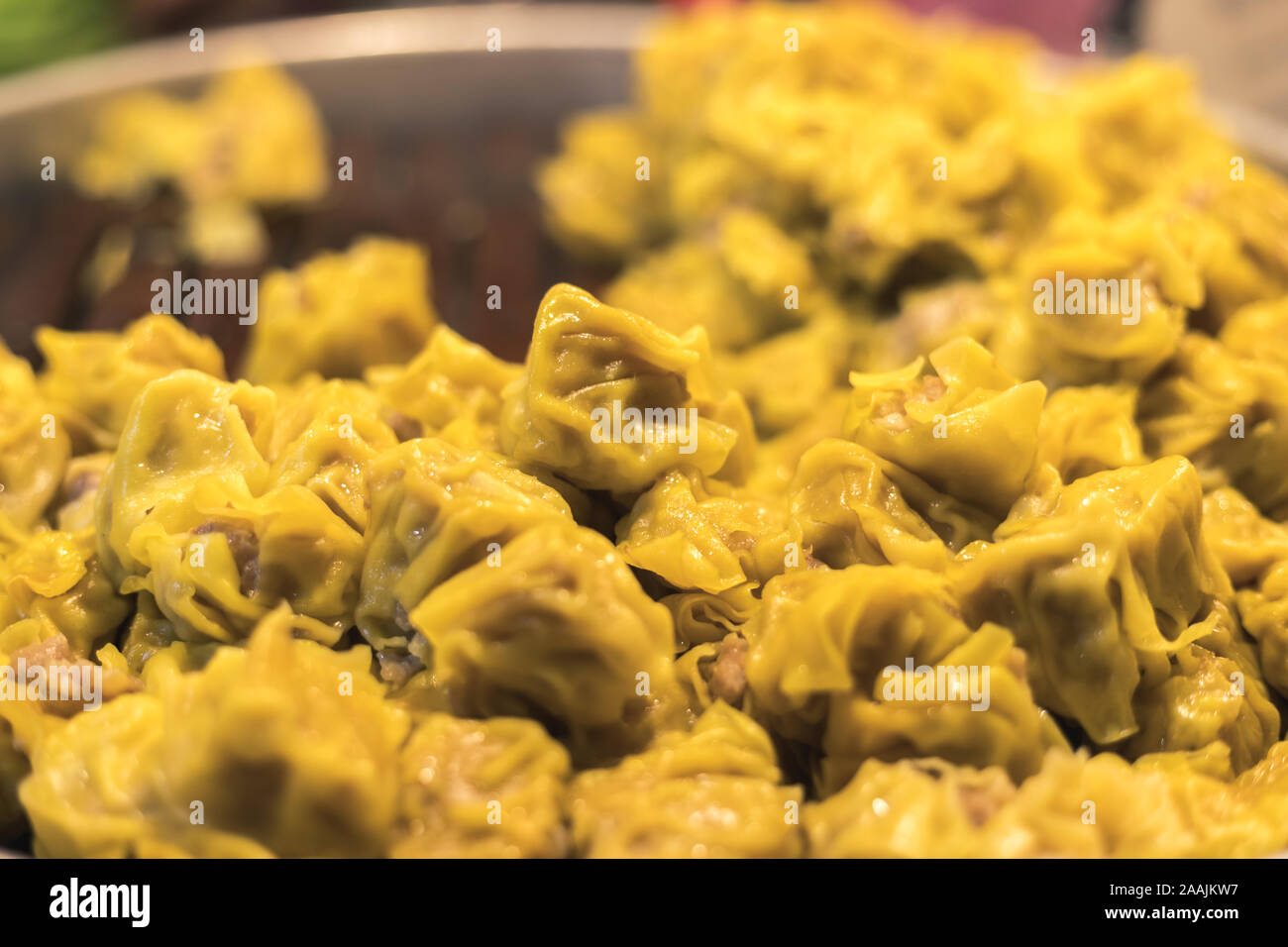 some kind of dumpling that can call Dim sum. it put pork inside and ...