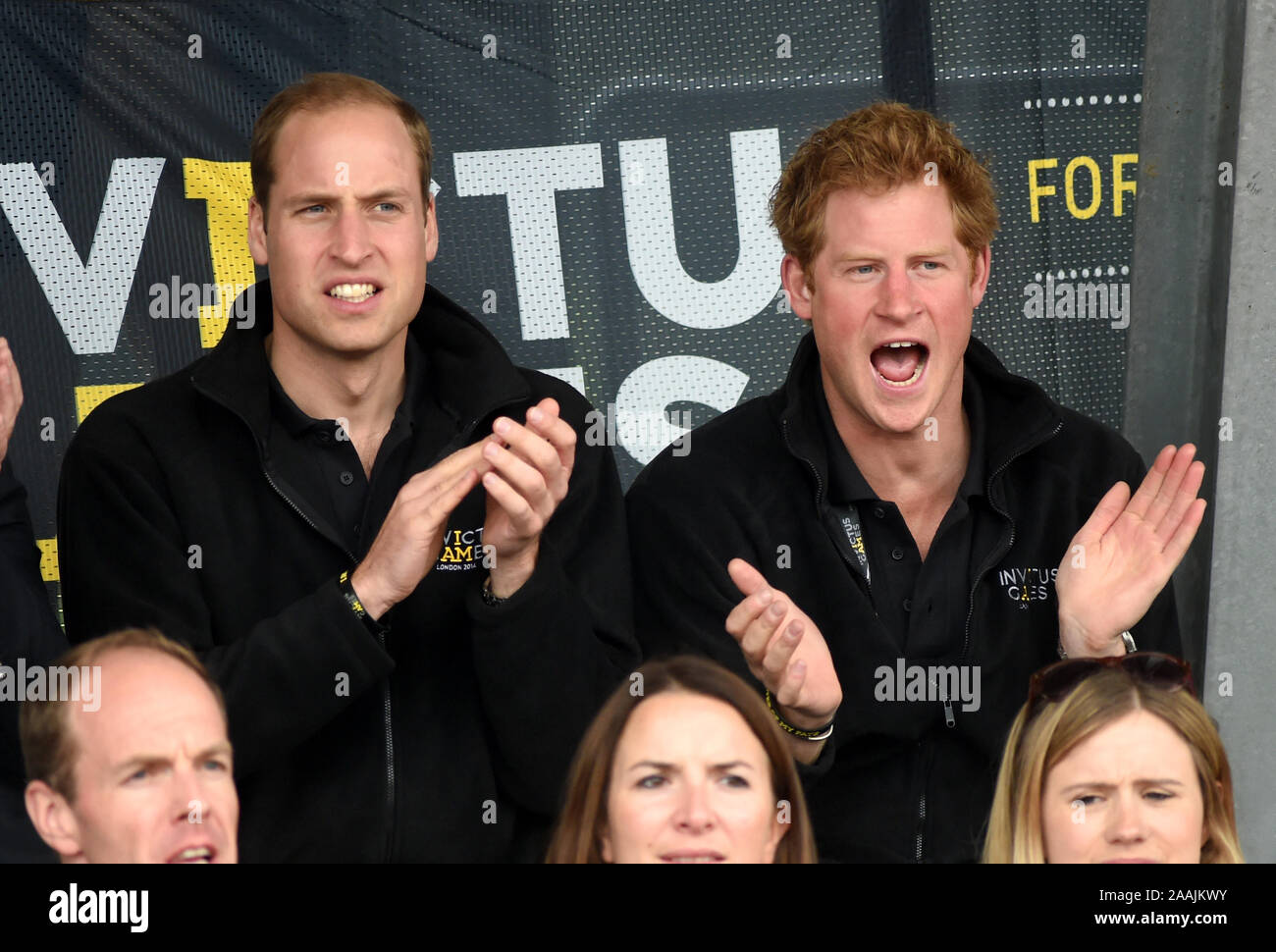 Prince Harry supported by his father Prince Charles and brother Prince ...