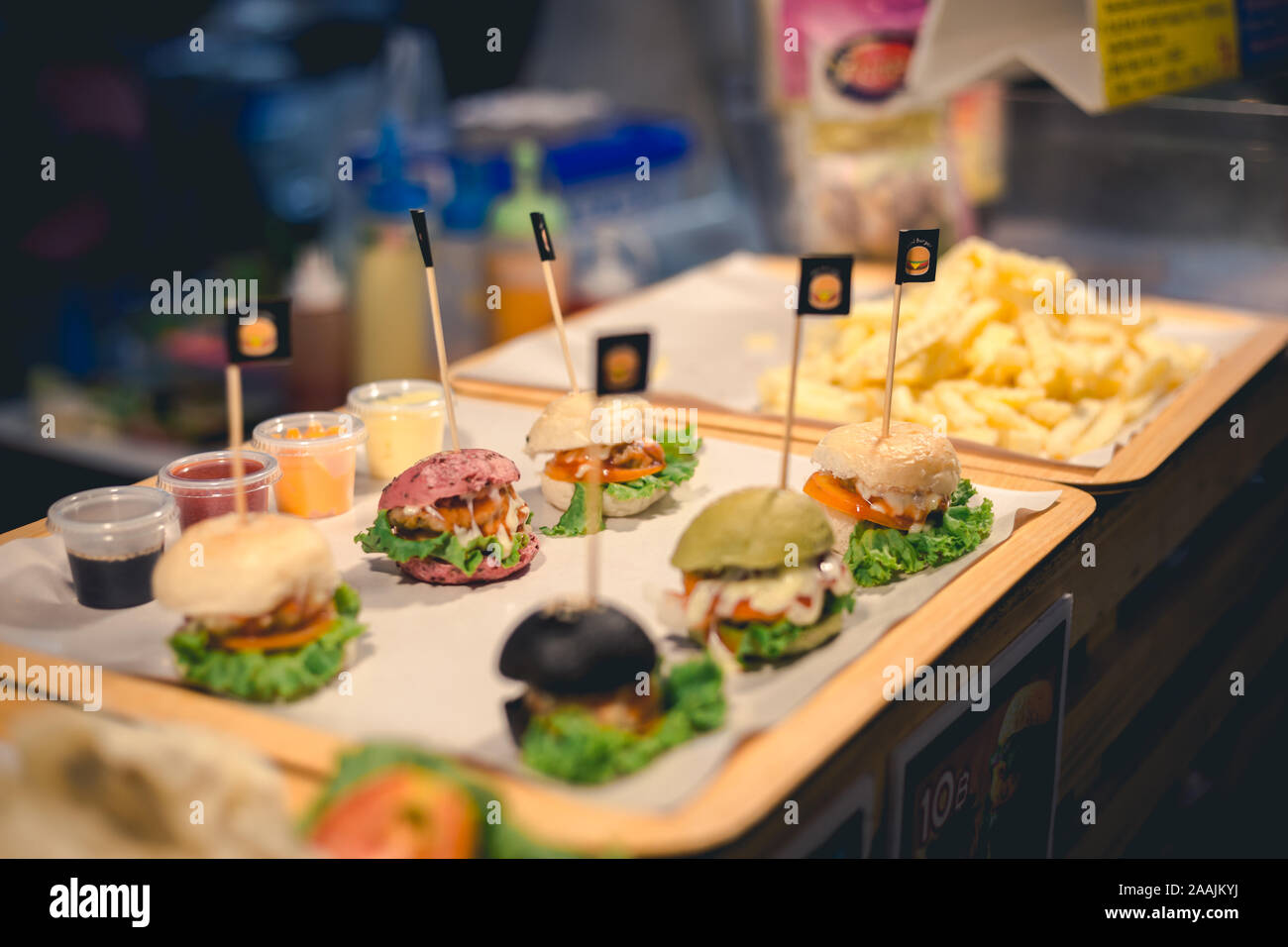 little burger serving with many sauce to choose Stock Photo - Alamy
