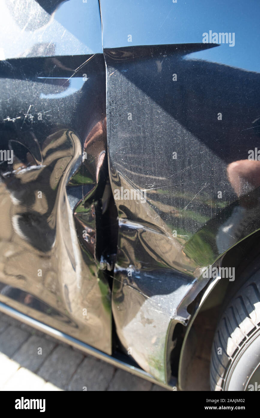 Car Crash: Damage and details of a wrecked vehicle. Close up crushed ...