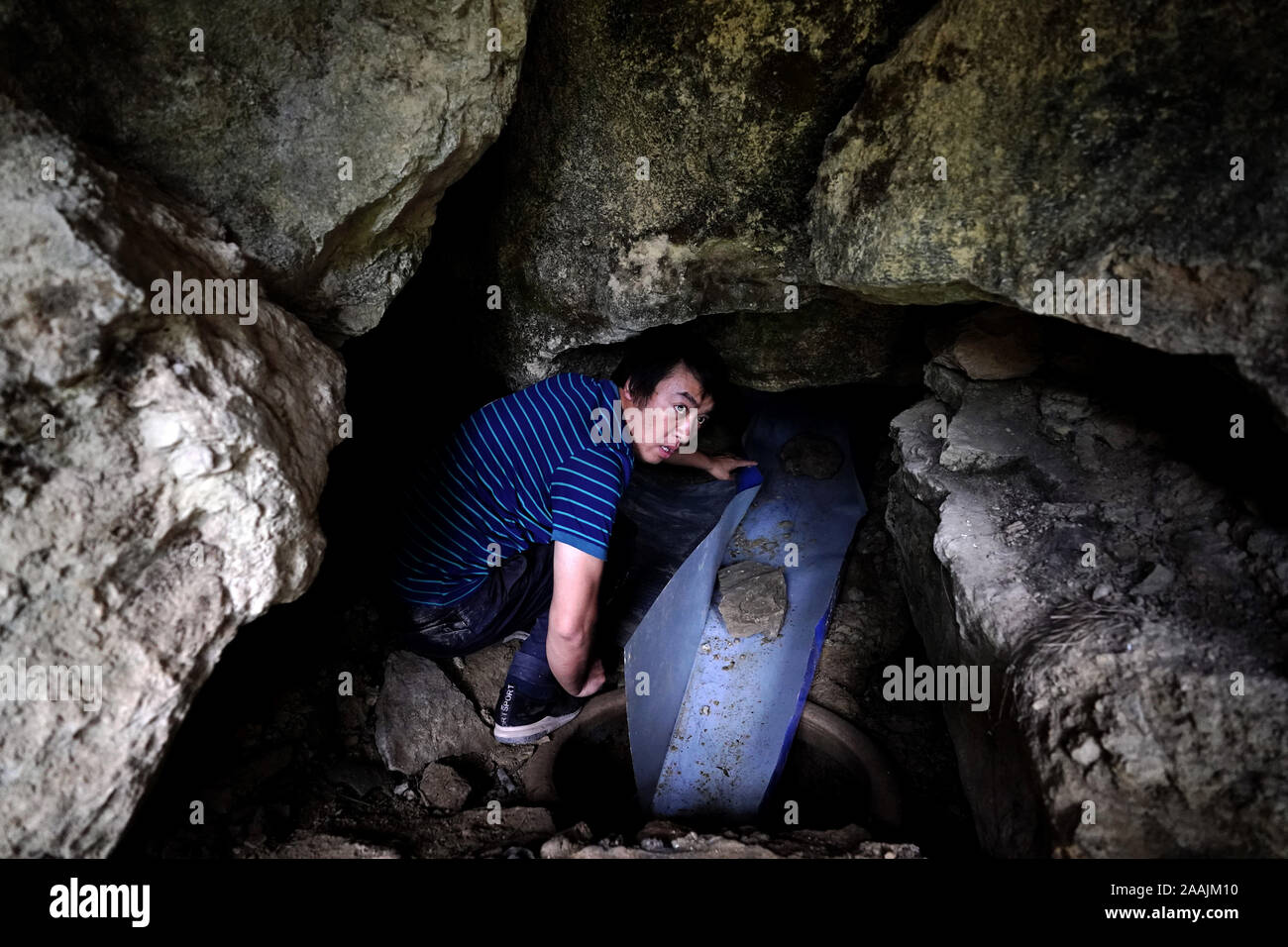 Spring water from a well in the mountains hi-res stock photography and ...