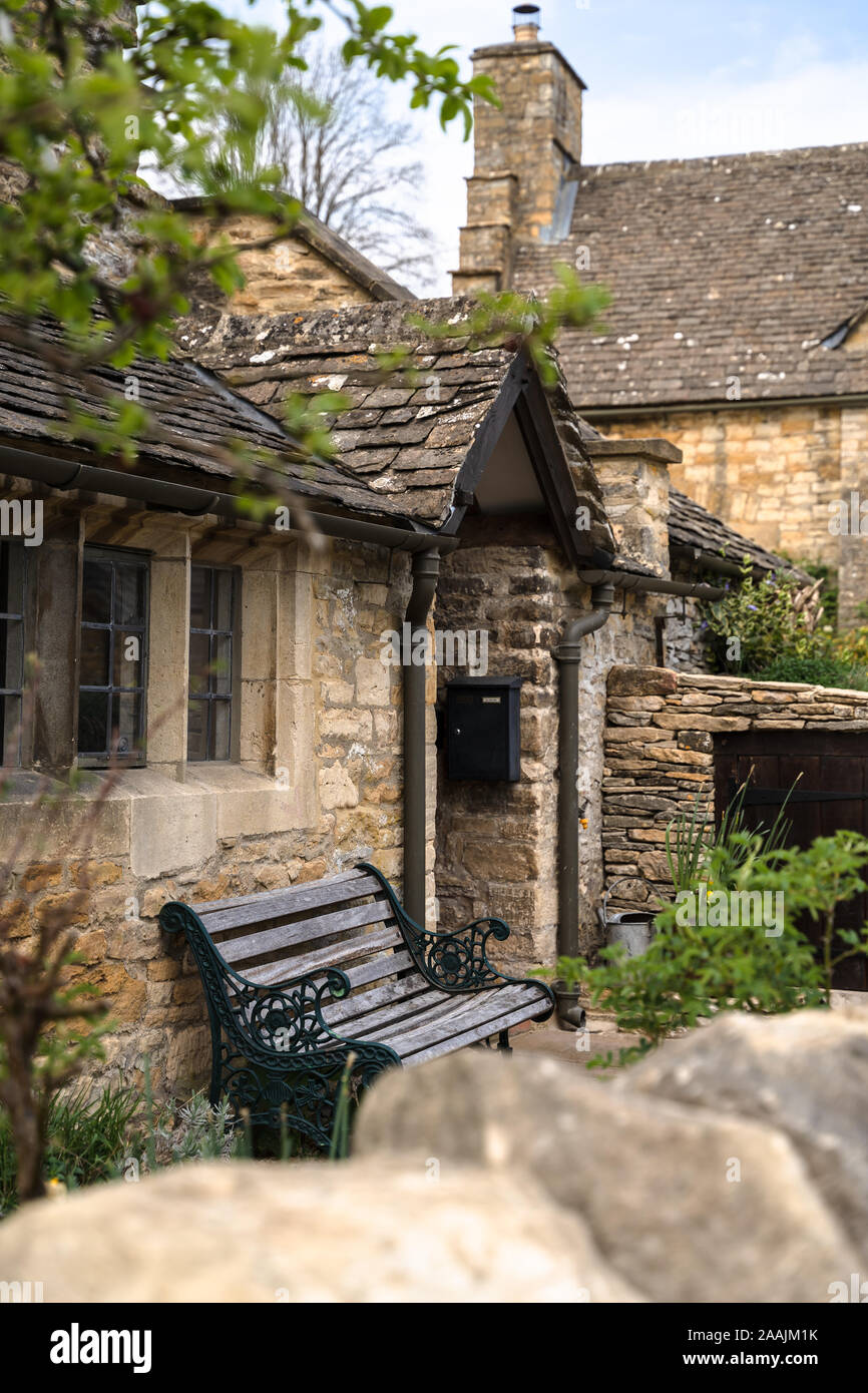 Cute traditional limestone stone houses in rural Britain, England ...