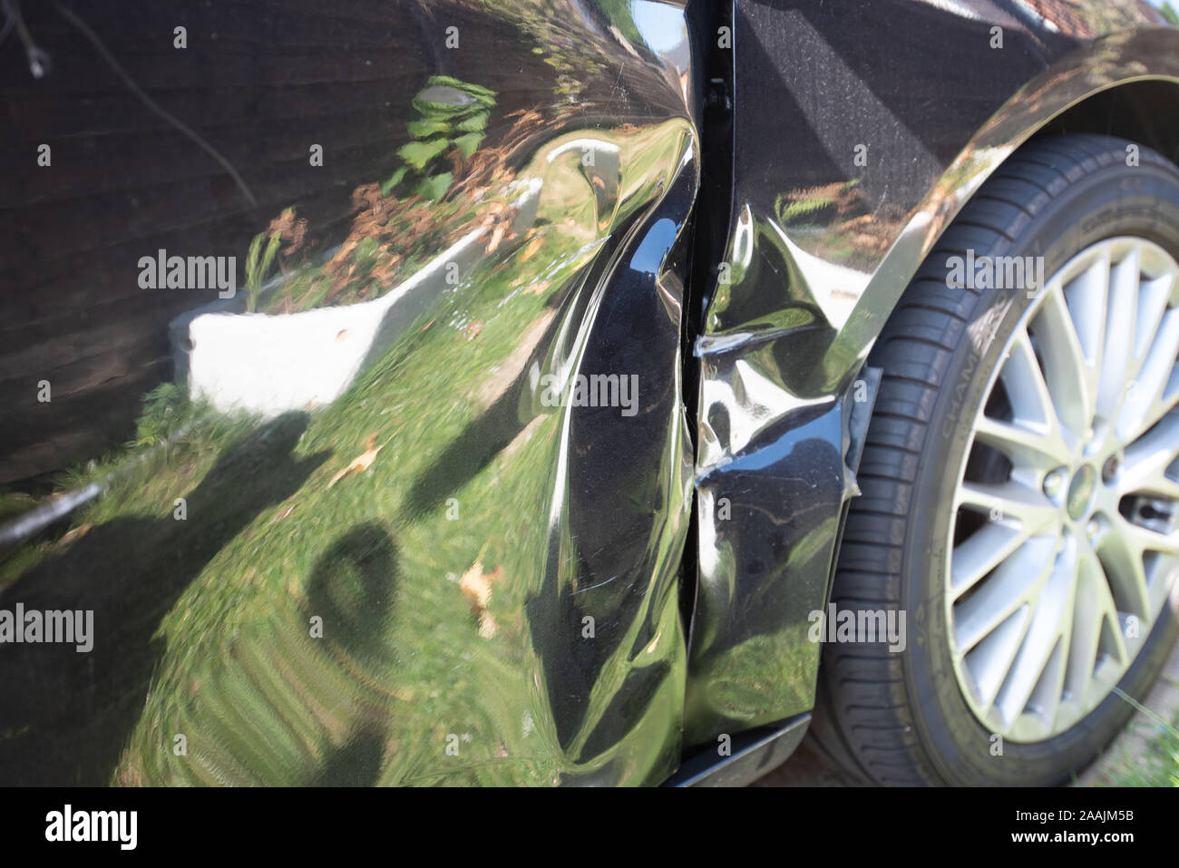 Car Crash: Damage and details of a wrecked vehicle. Close up crushed ...