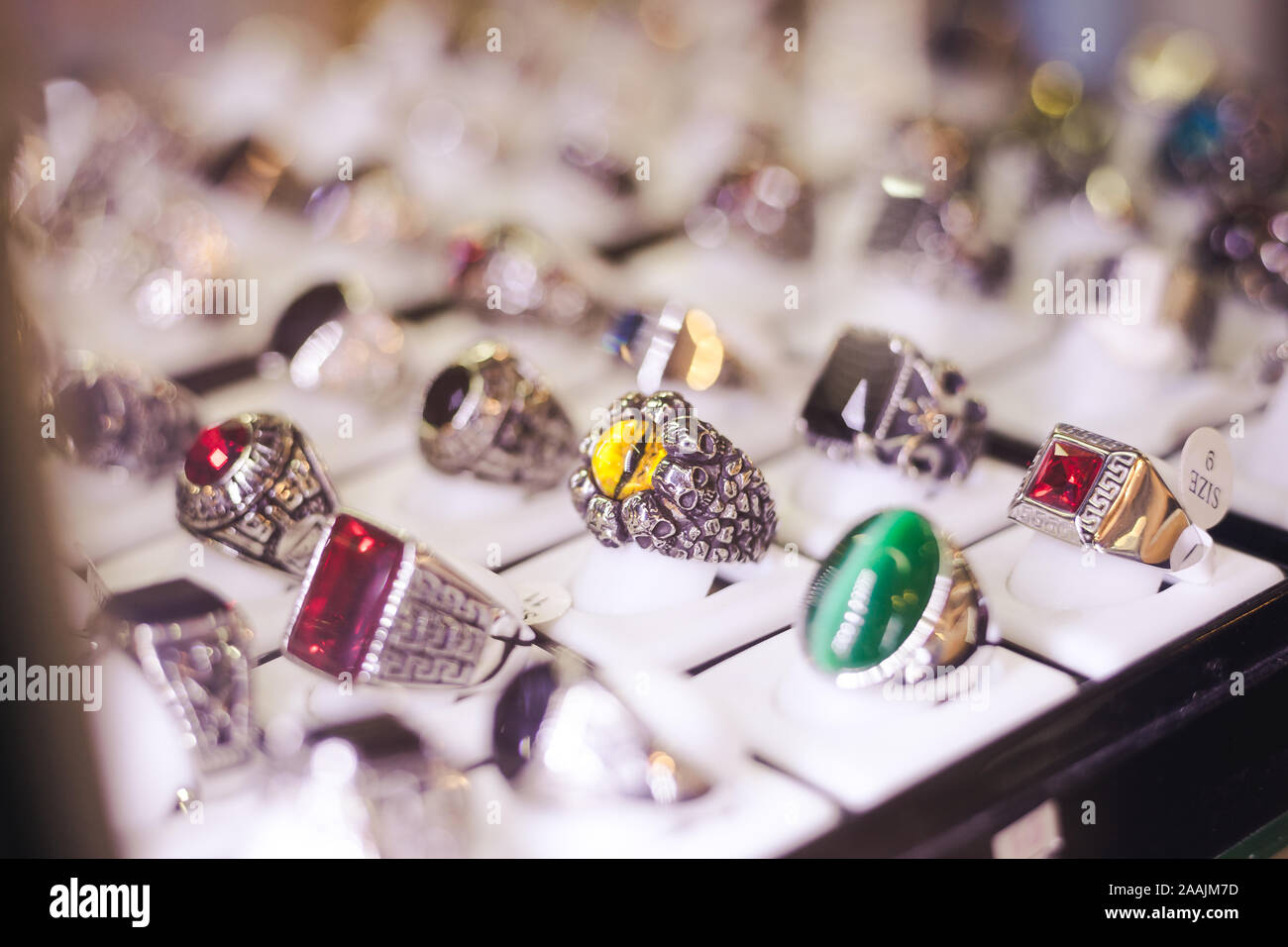 Closeup of Many element type of rings in a showcase Stock Photo - Alamy
