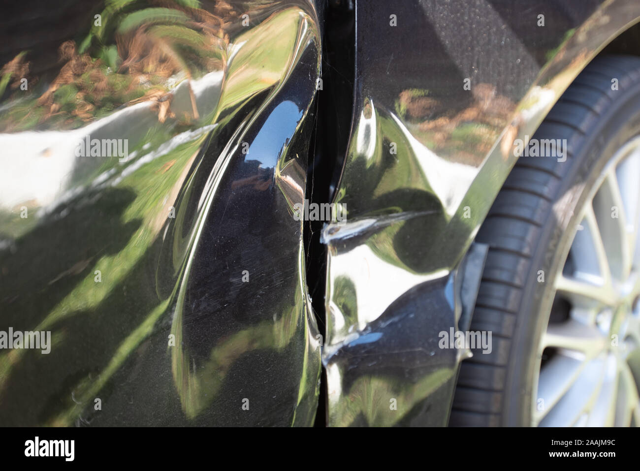 Car Crash: Damage and details of a wrecked vehicle. Close up crushed ...