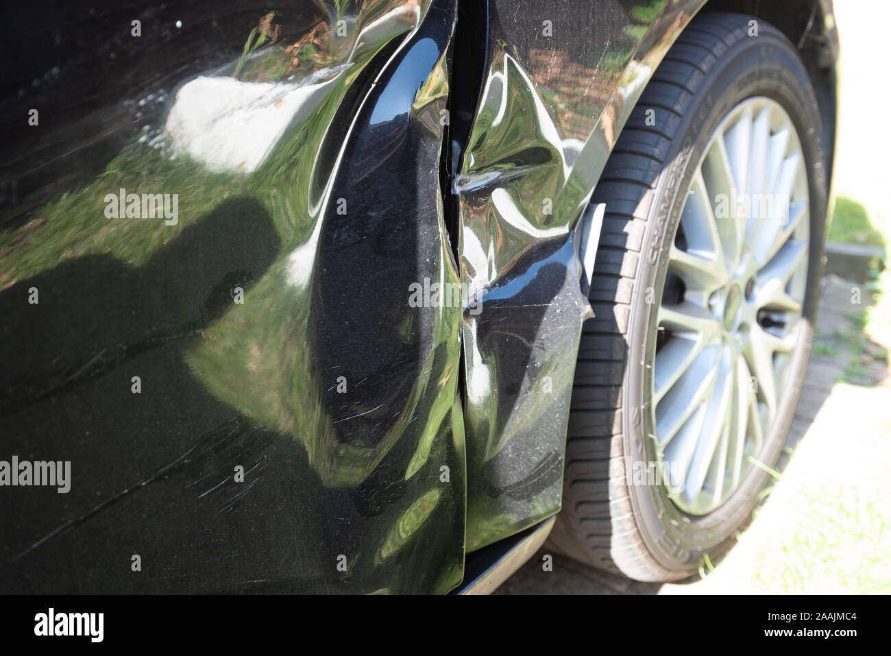 Car Crash: Damage and details of a wrecked vehicle. Close up crushed ...
