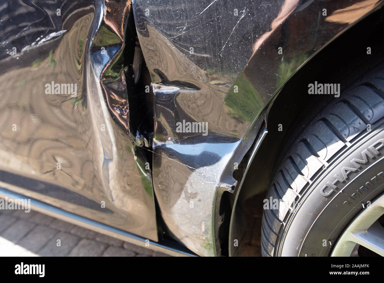 Car Crash: Damage and details of a wrecked vehicle. Close up crushed ...