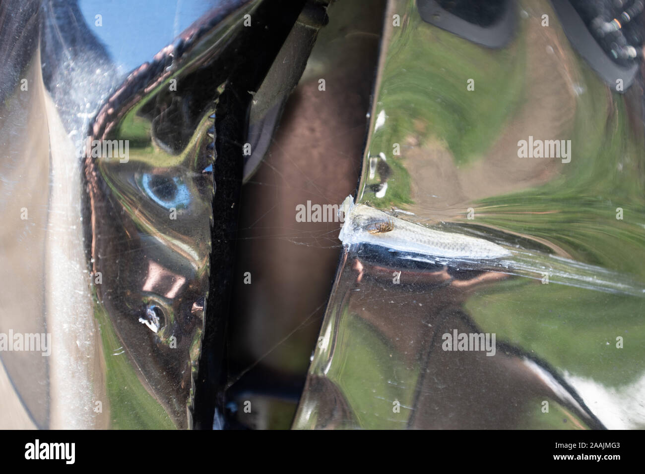 Car Crash: Damage and details of a wrecked vehicle. Close up crushed ...