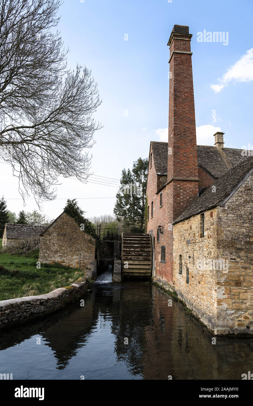 Cute traditional limestone stone houses in rural Britain, England ...