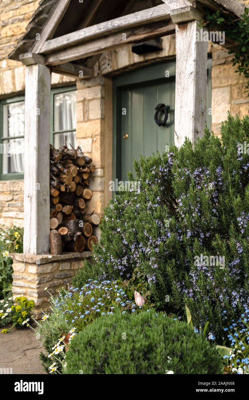 Cute traditional limestone stone houses in rural Britain, England ...