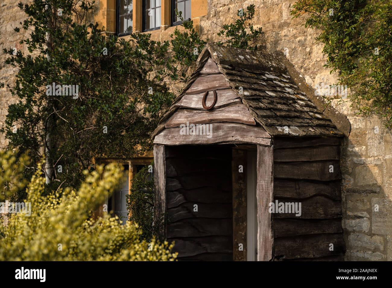 Cute traditional limestone stone houses in rural Britain, England ...