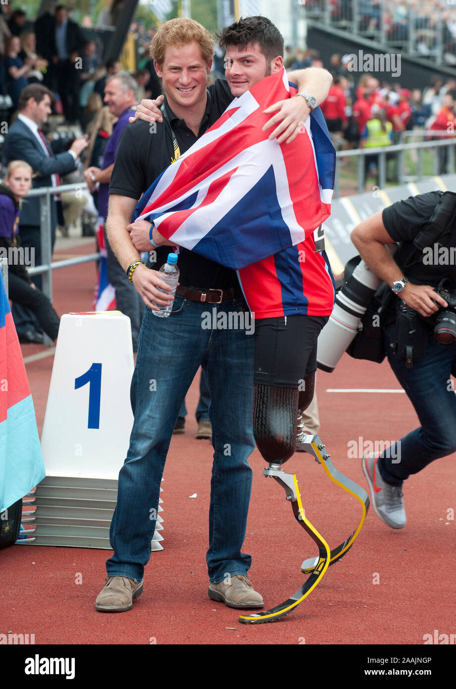 Prince Harry, with team Captain David Henson winner of the 200m race at ...