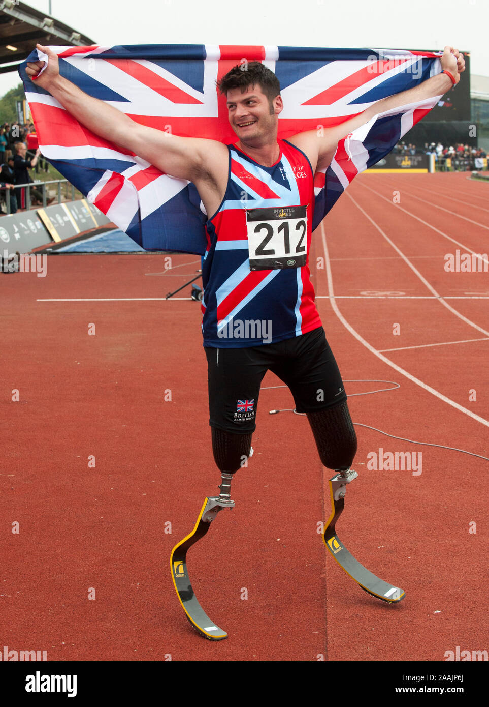 Prince Harry, with team Captain David Henson winner of the 200m race at ...