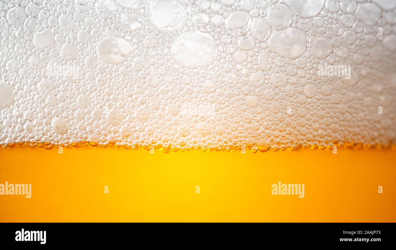 Light Beer with Bubbles and Foam Background. Beer Bubbles Texture Close ...