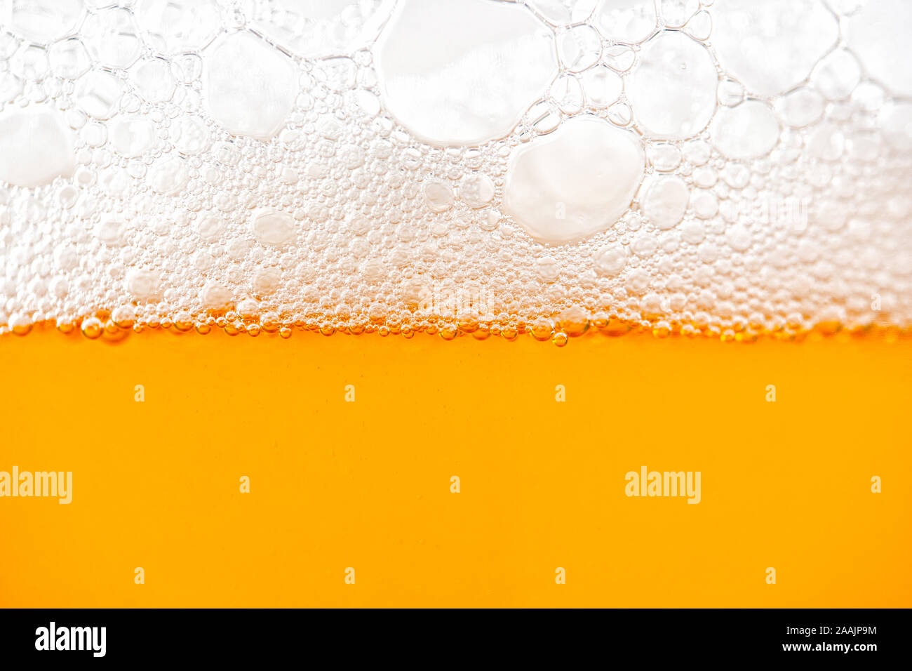 Light Beer with Bubbles and Foam Background. Beer Bubbles Texture Close ...