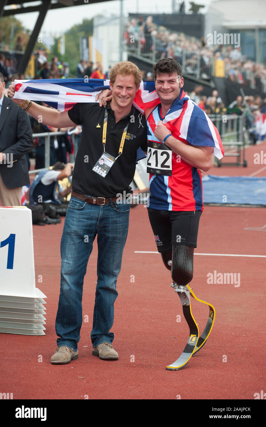 Prince Harry, with team Captain David Henson winner of the 200m race at ...